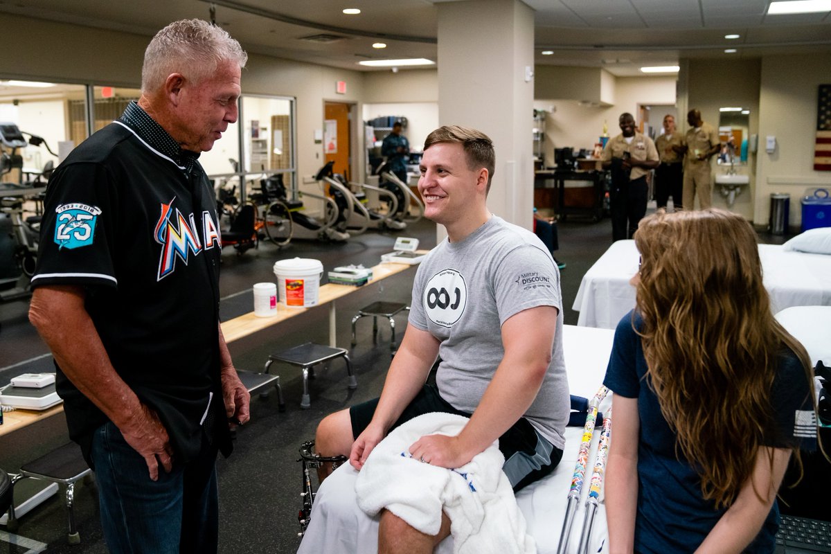 Several Marlins players, manager Don Mattingly, coaches, and front ...