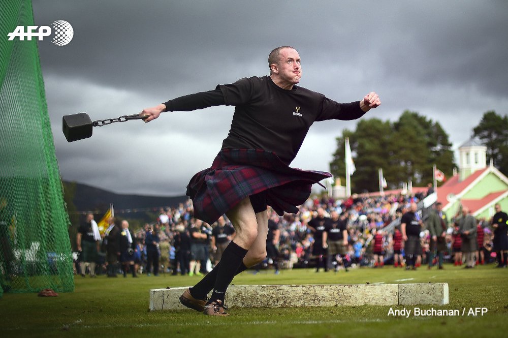 Competitors take part in traditional Scottish Highland Games during the ...