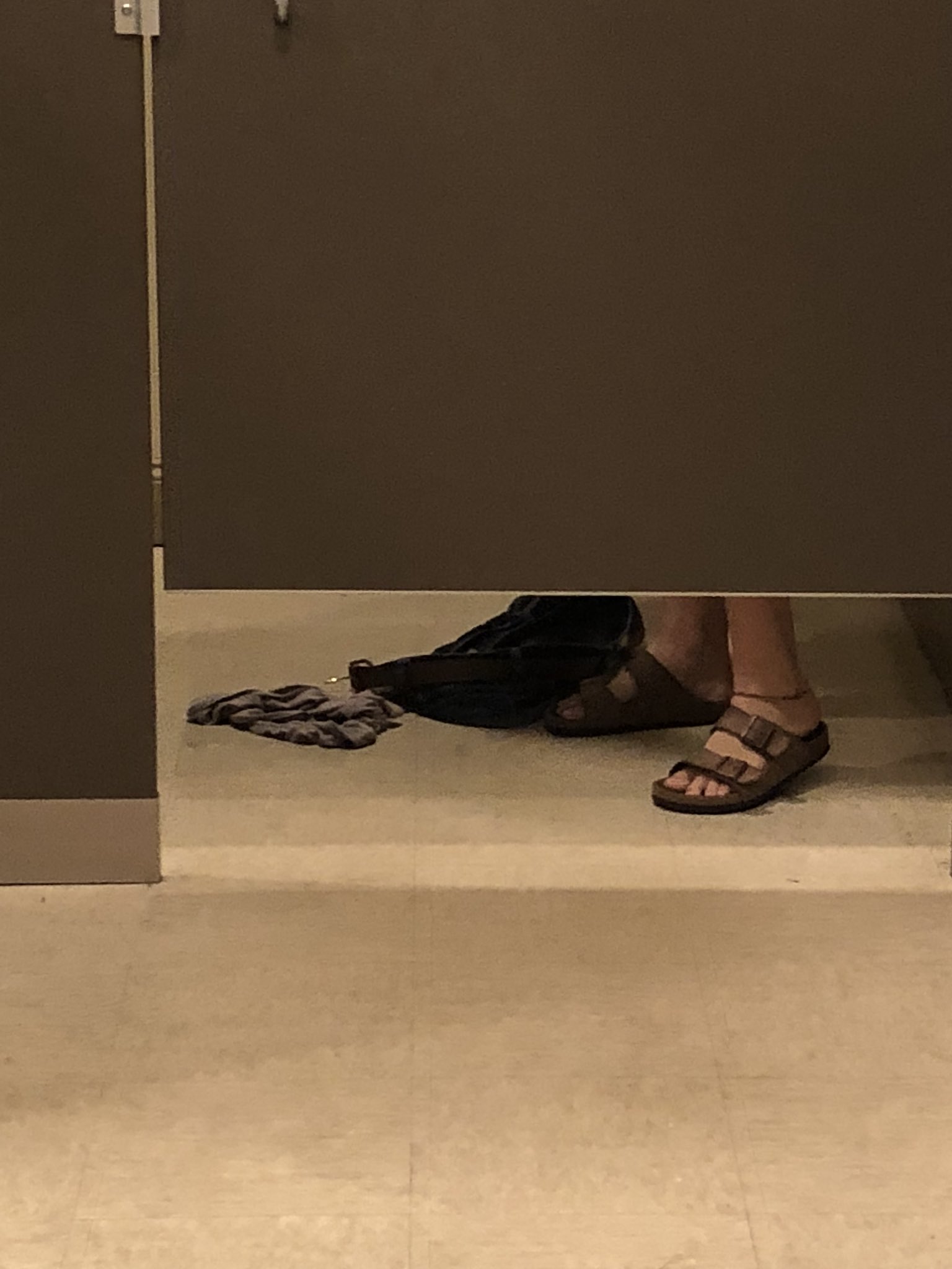 Bathroom Stall Feet