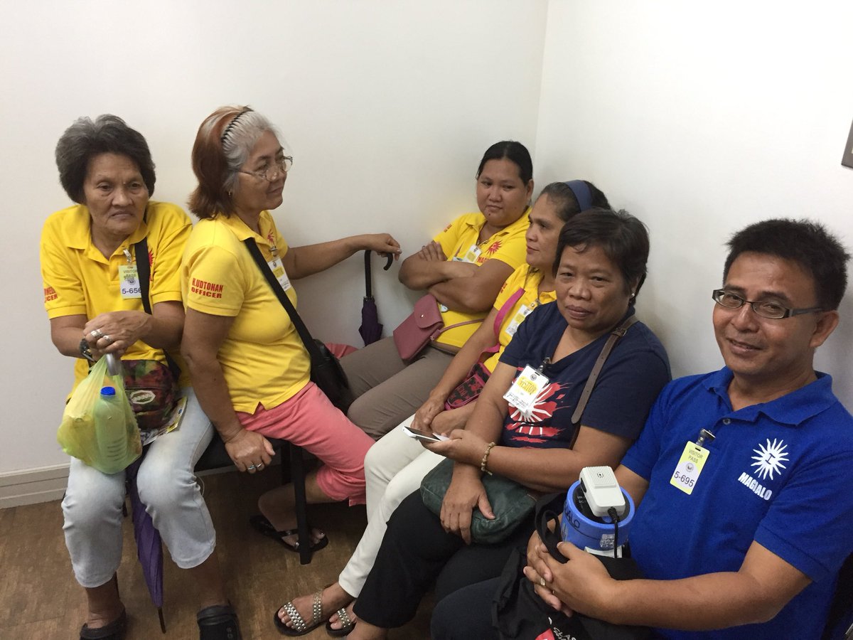 Magdalo members and supporters arrive at the Senate to show support for ...