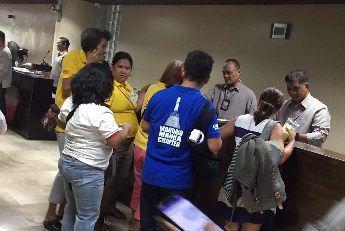Magdalo members and supporters arrive at the Senate to show support for ...