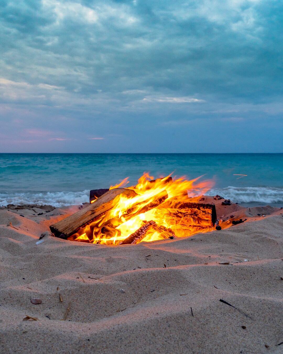 Daytime Bonfire On Beach