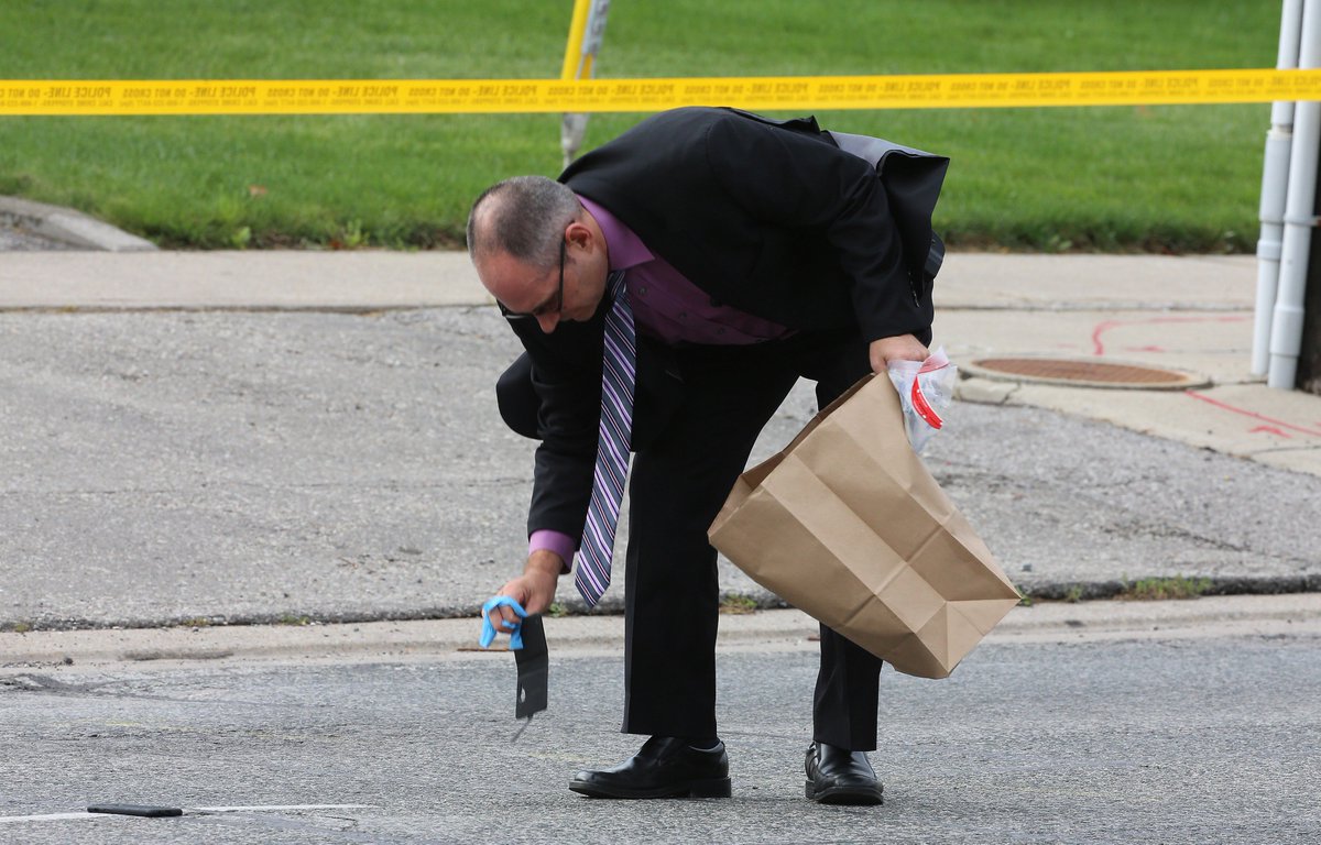 Man Picking Up Something