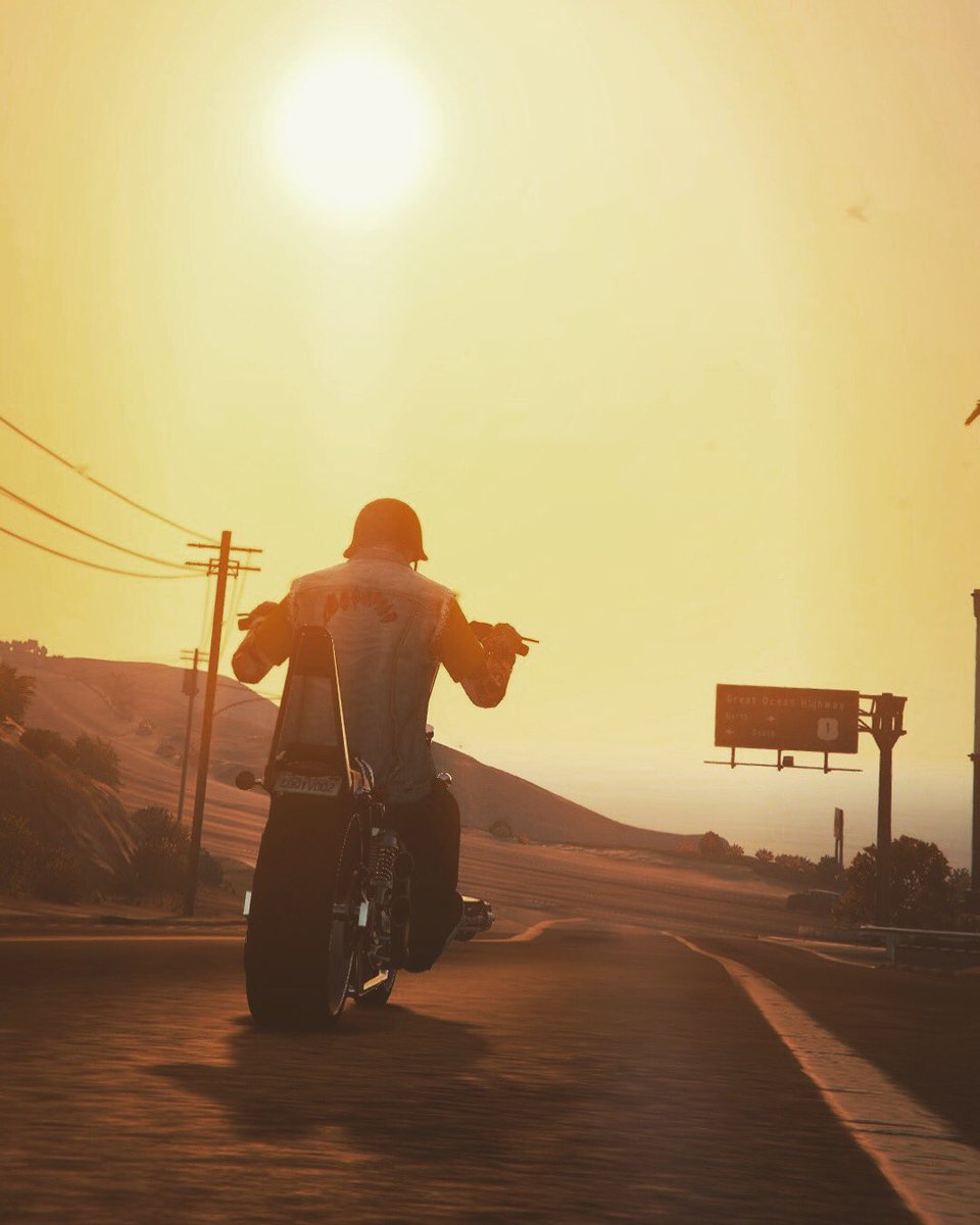 Motorcycle Riding Into Sunset