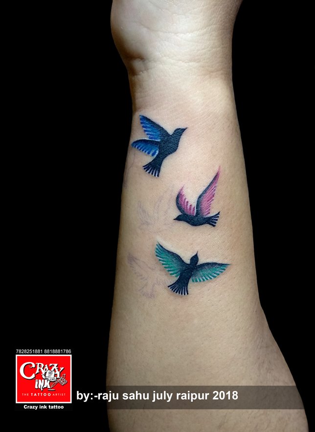 Colorful Bird Tattoos On Wrist