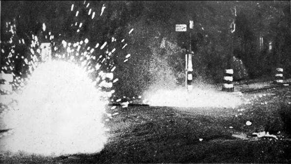 German raiders dropping incendiary bombs over southern England; they're ...