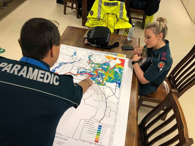 Paramedic Kirily stopping by the Edmund Rice Hall Evacuation Centre for ...