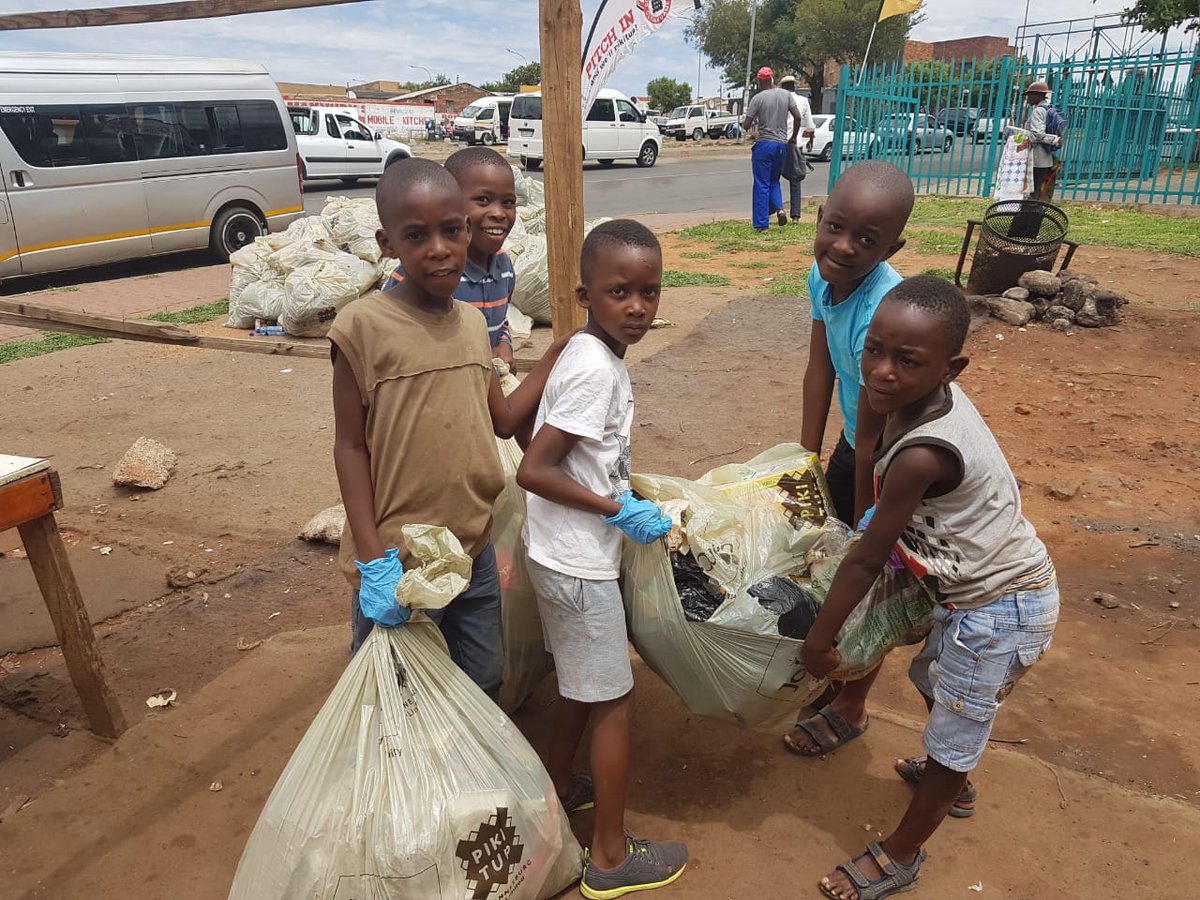 Children Cleaning The Environment