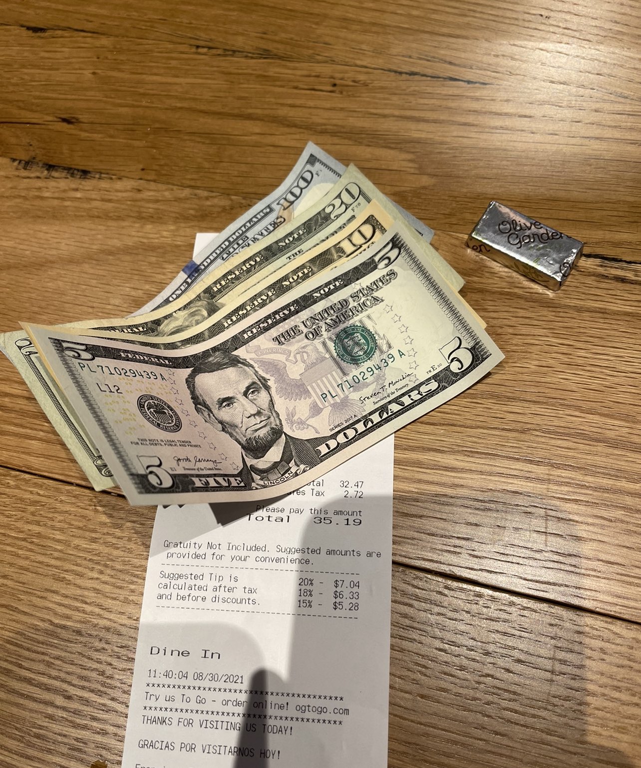 100 Dollar Bills On Bed