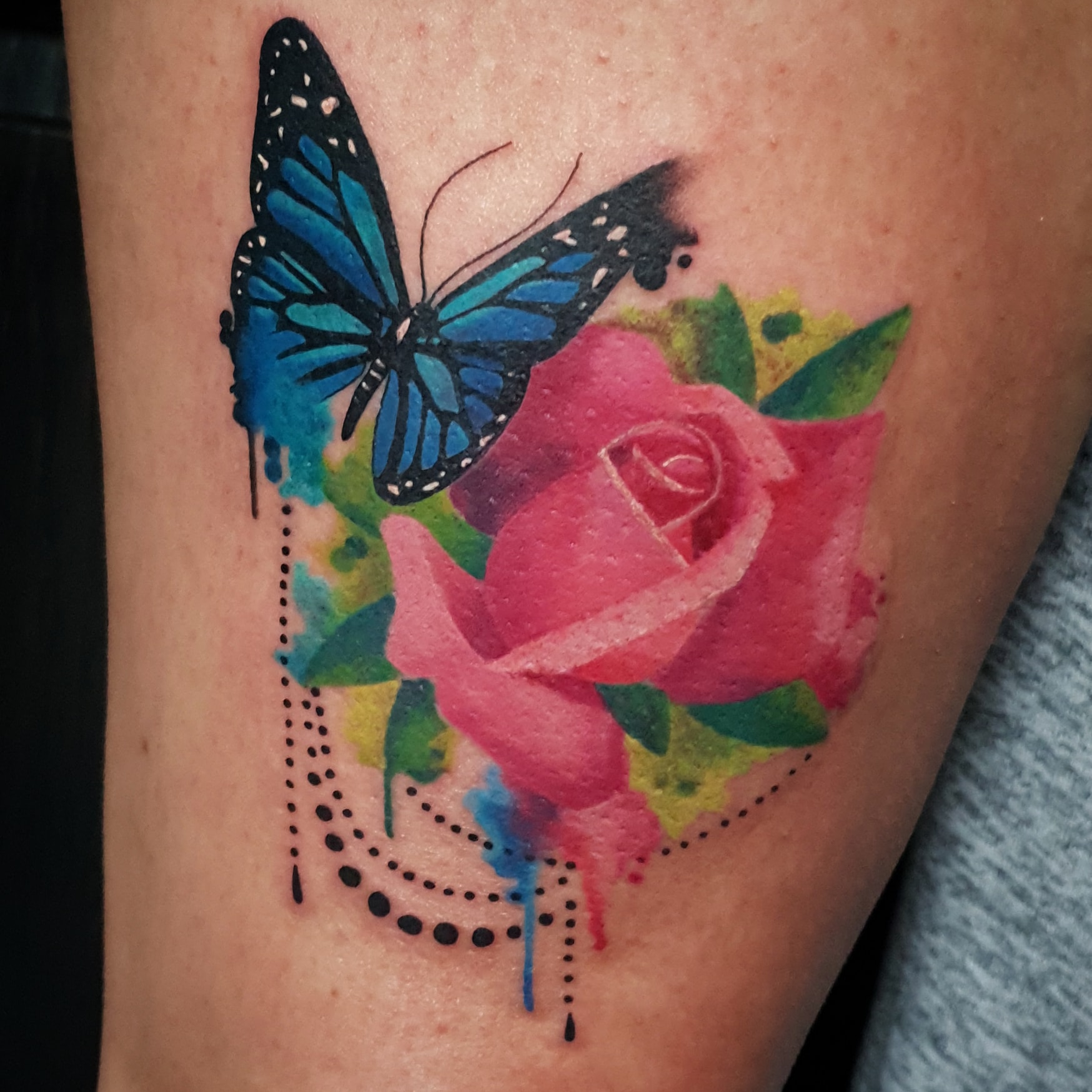 Butterfly On A Rose Tattoo