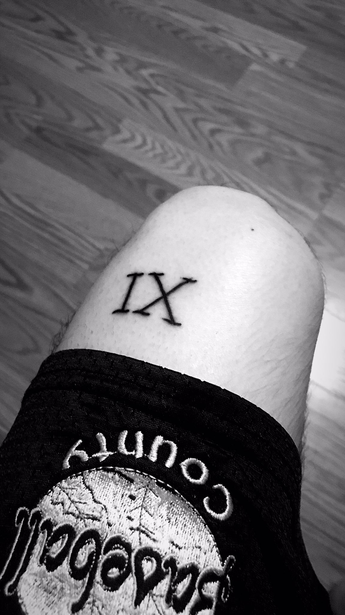 Roman Numeral X Tattoo