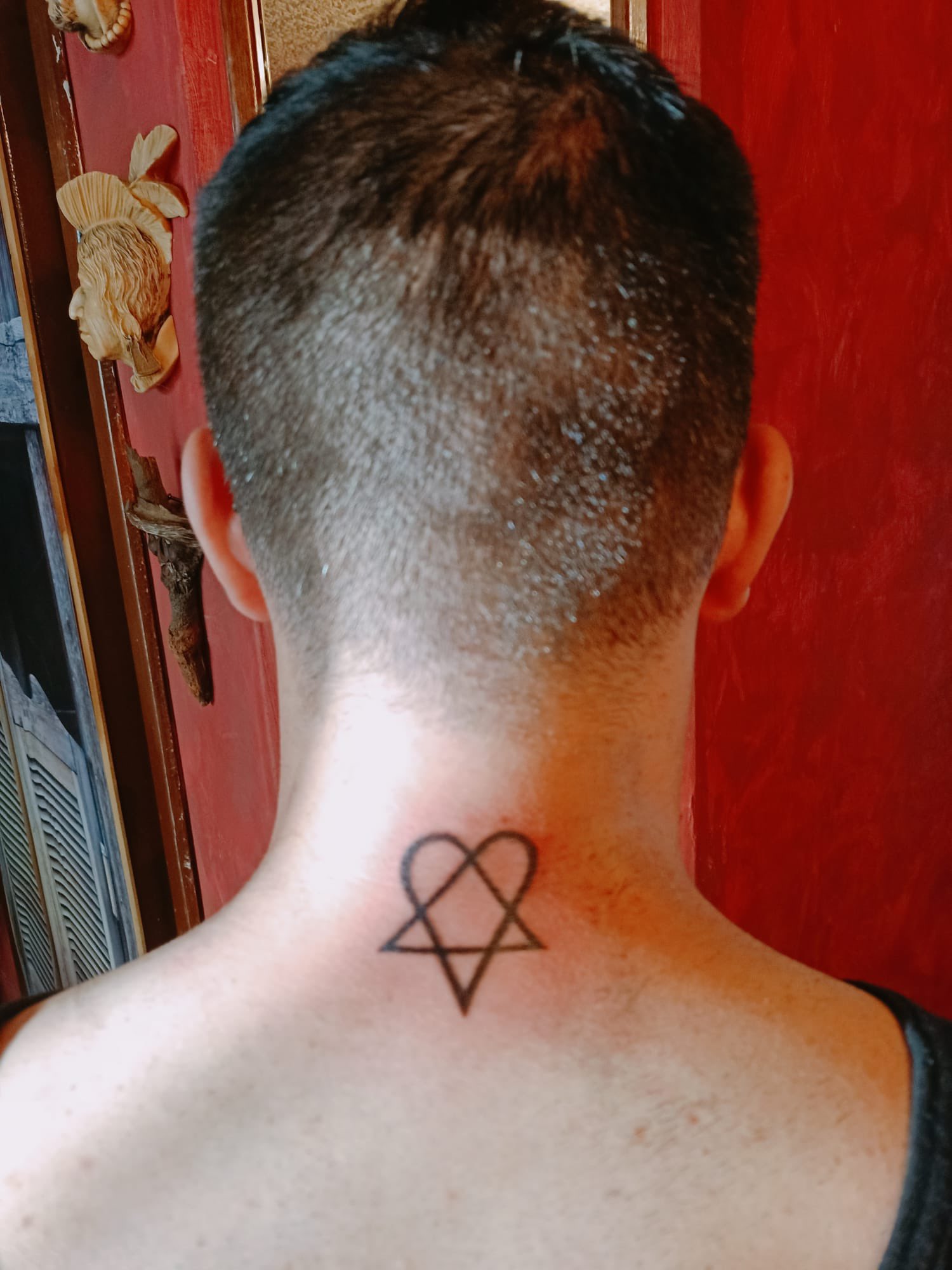 Heartagram Tattoo On Ribs