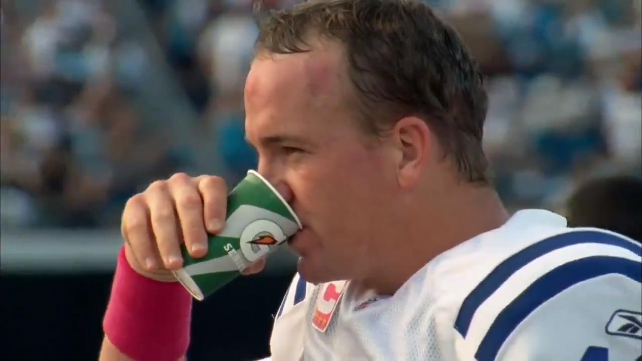 Football Players Drinking Gatorade