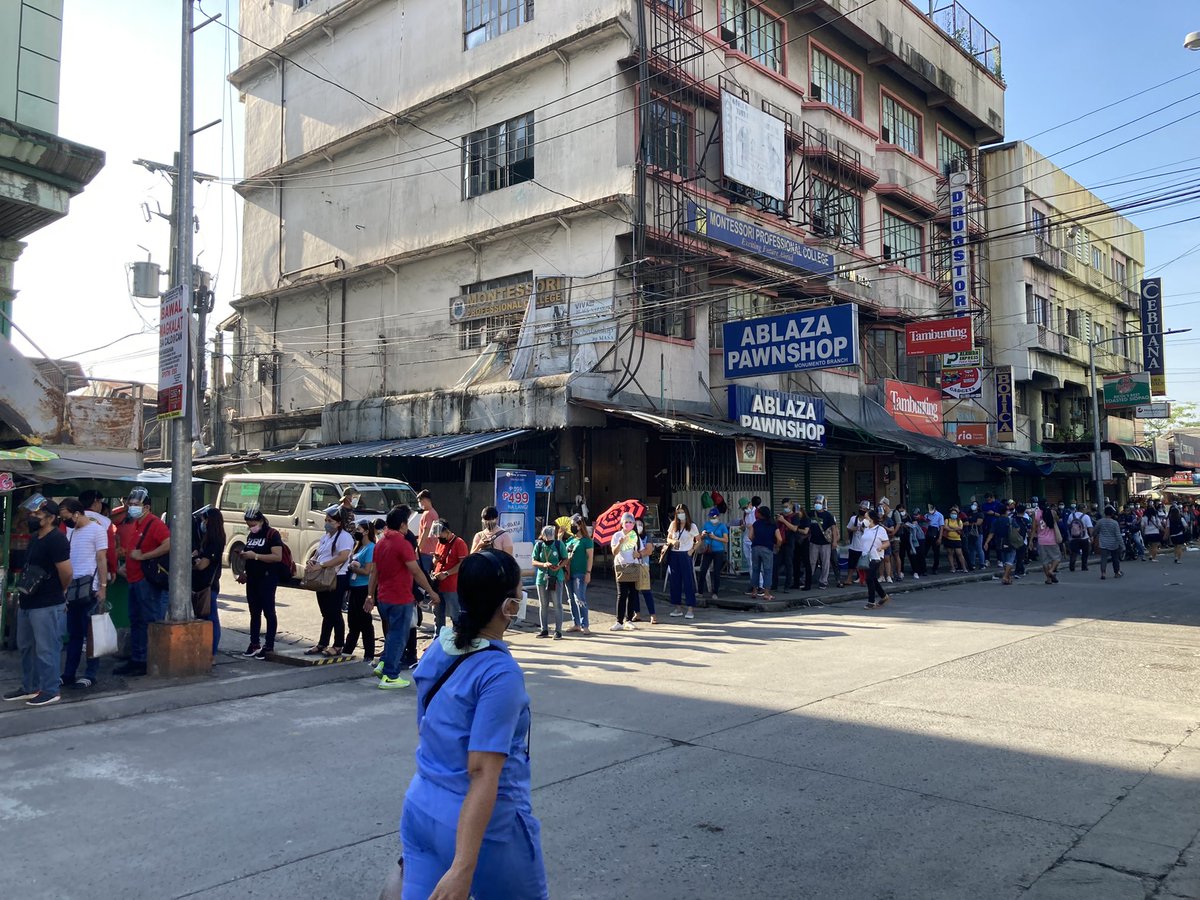 LOOK: Long line of commuters at the Monumento station of EDSA Bus ...