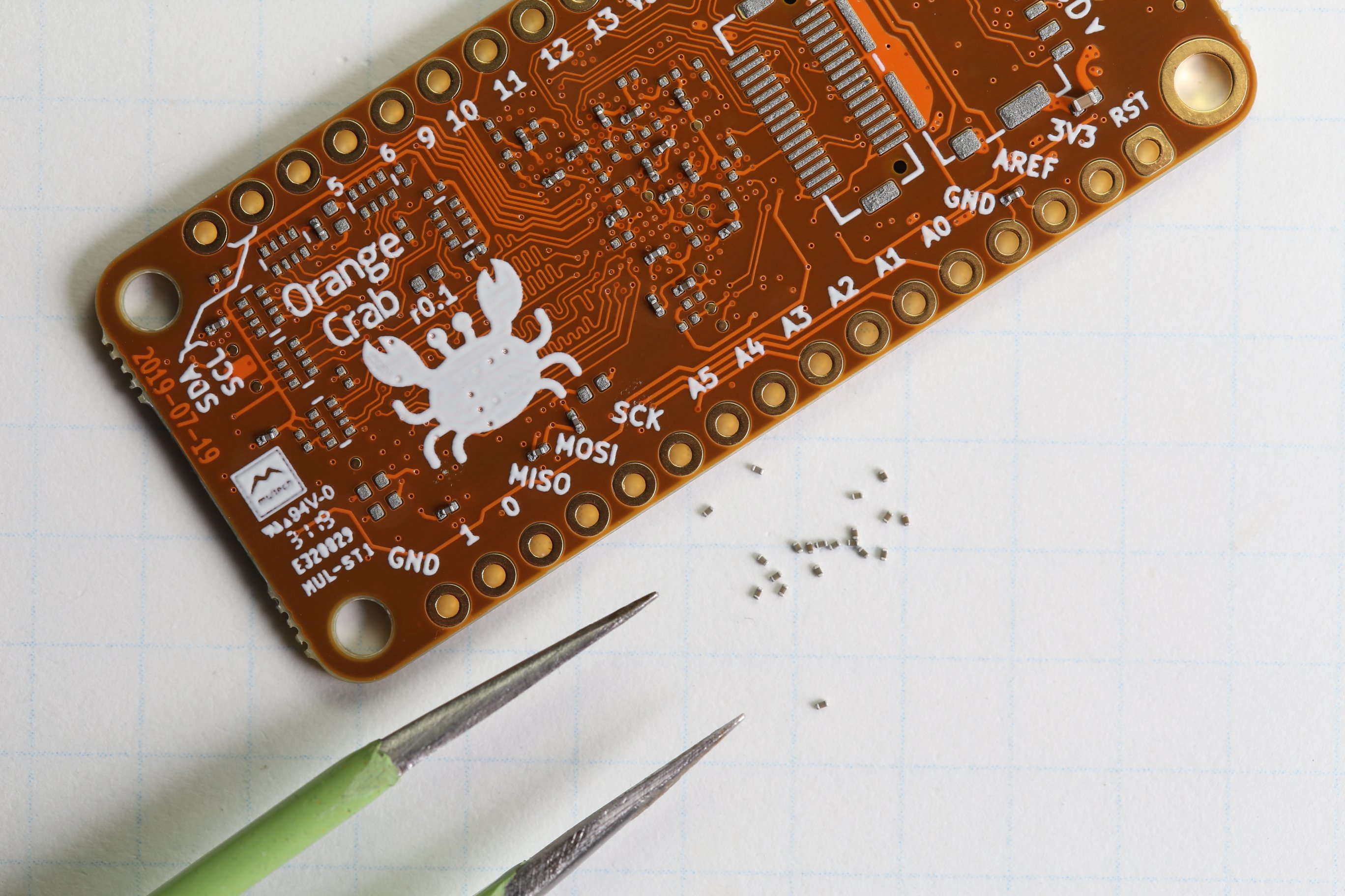 Greg on Twitter: "The OrangeCrab! A Lattice ECP5 based FPGA mini development board in a Feather ...