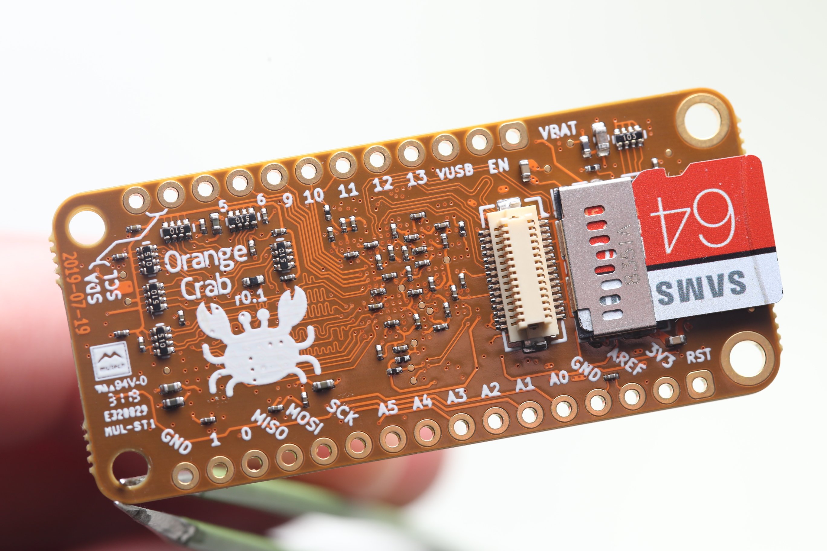 Greg on Twitter: "The OrangeCrab! A Lattice ECP5 based FPGA mini development board in a Feather ...
