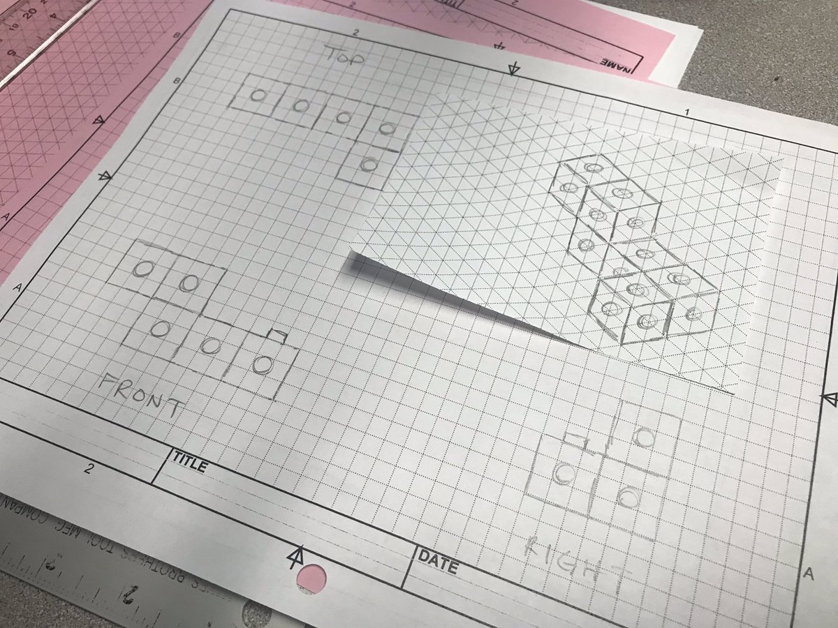 Students learning how to create professional sketches using isometric ...