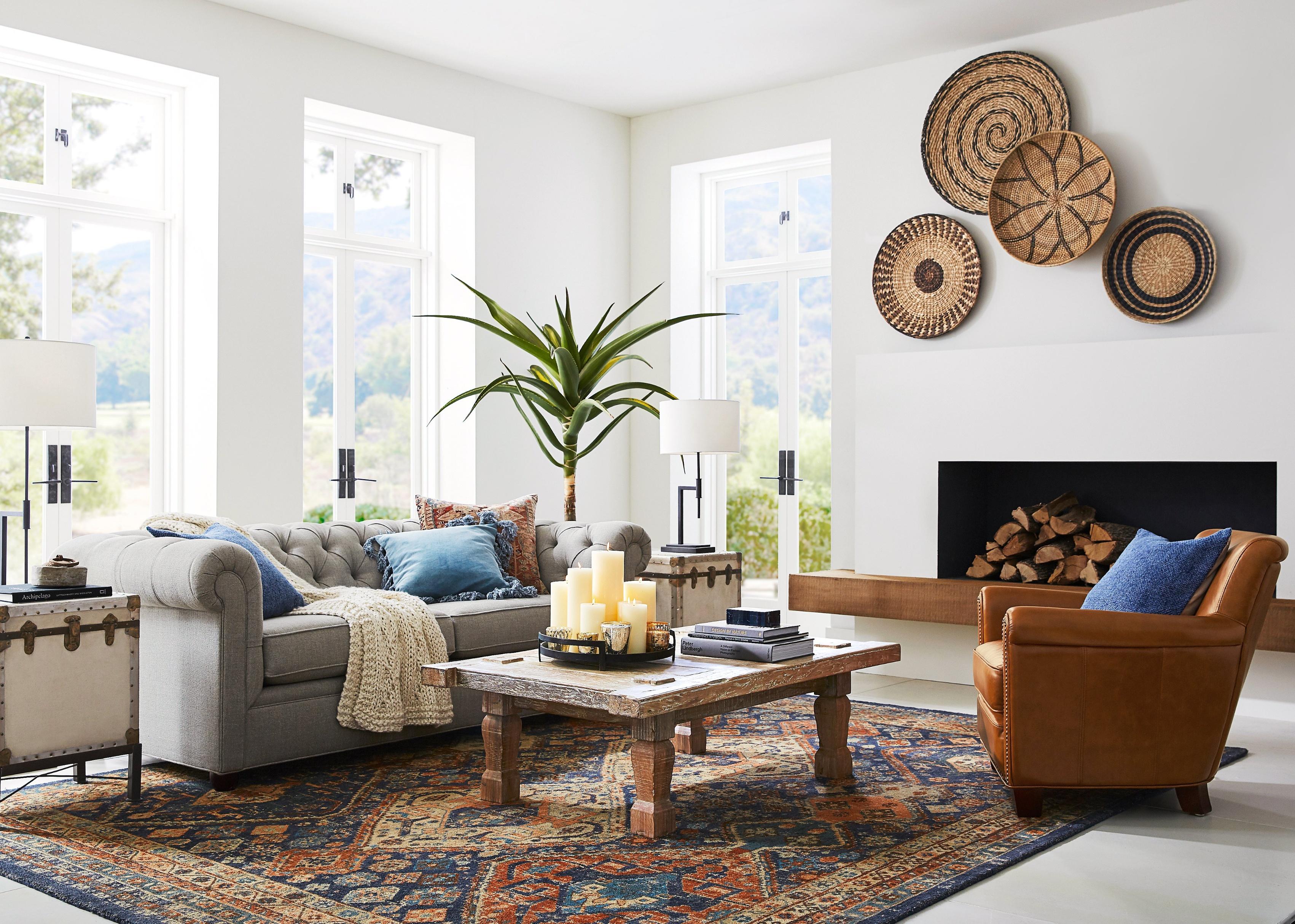 Pottery Barn X Hand crafted in America using eco friendly components our Chesterfield Upholstered Sofa gets a global feel when paired with the Takhat Reclaimed Wood Coffee Table Shop the look here