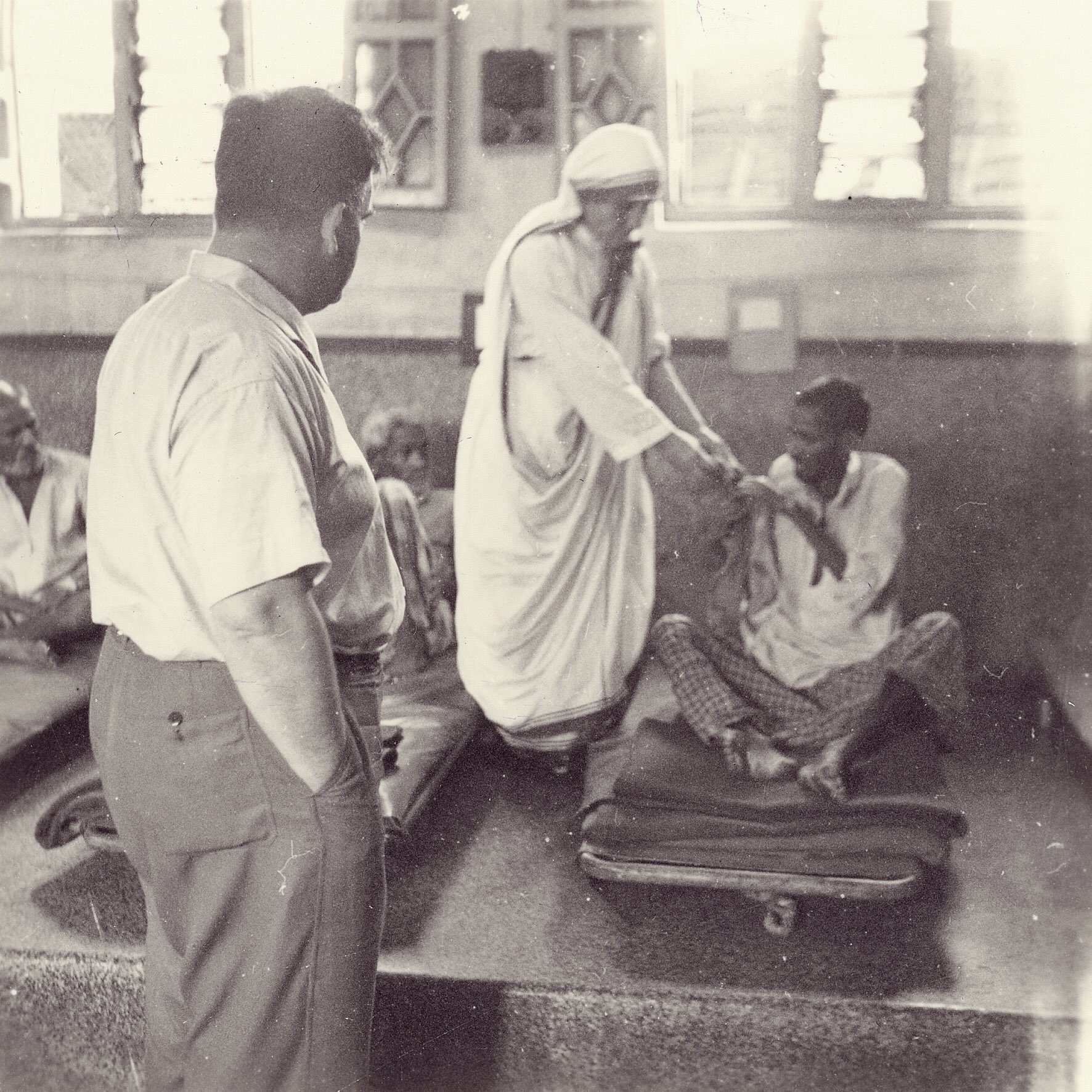 Mother Teresa Helping The Sick