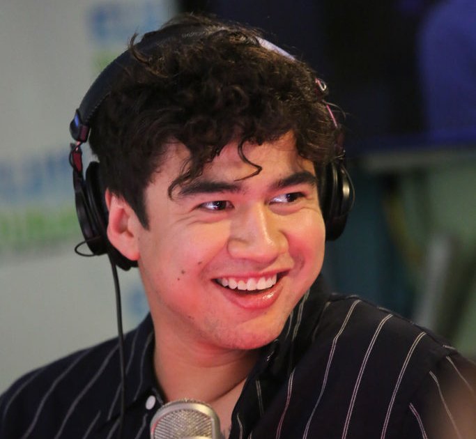 Calum Hood Smiling With Teeth