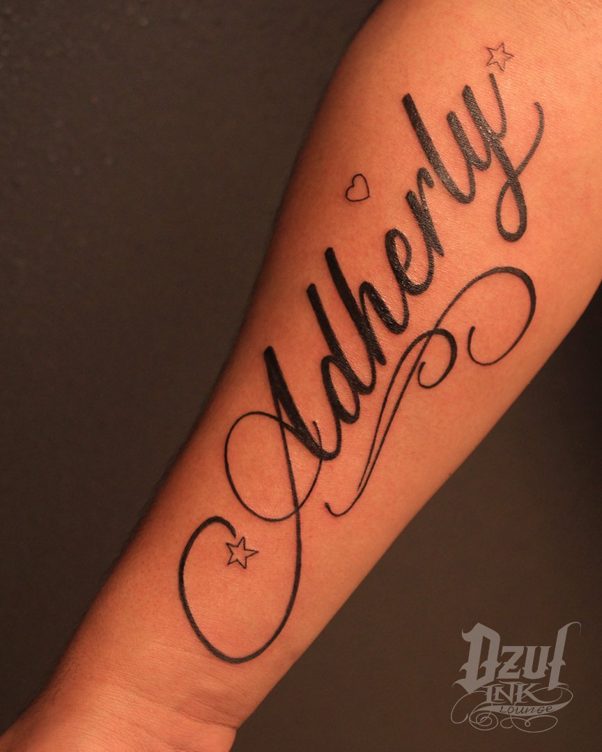 Cursive Name Alex Tattoo