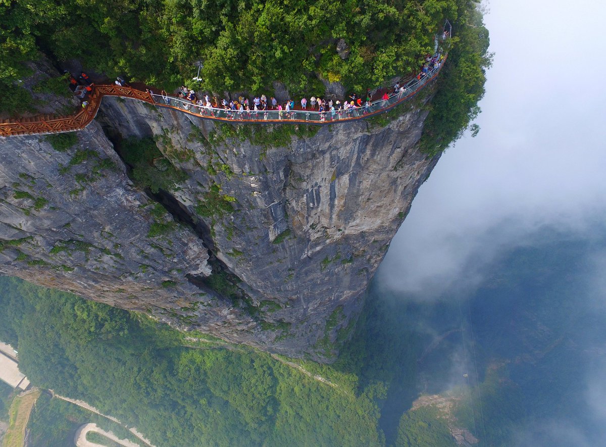 Acrophobia ALERT! Tourists walk on the 100-m-long and 1.6-m-wide ...