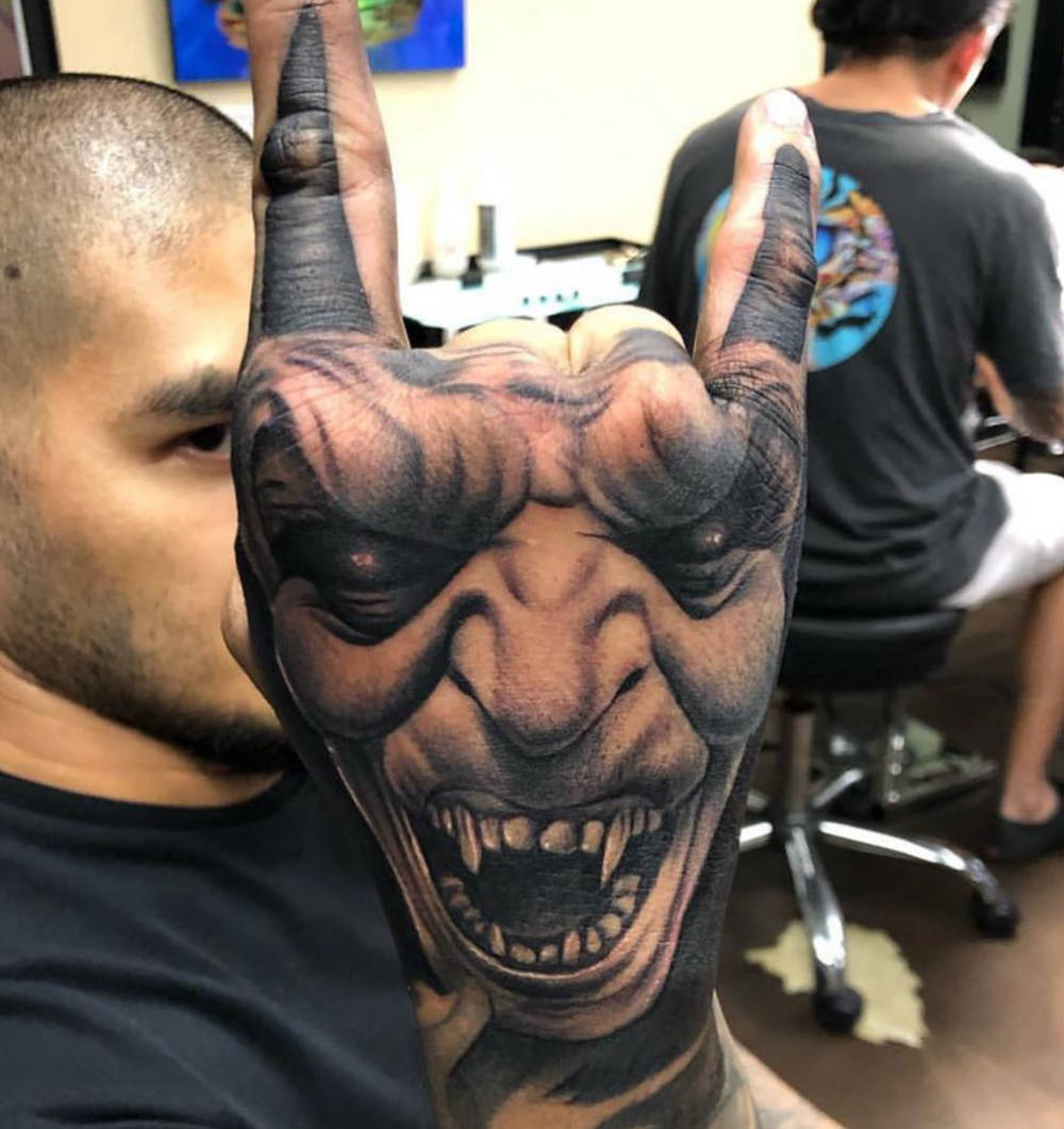 Demon Hand Tattoos
