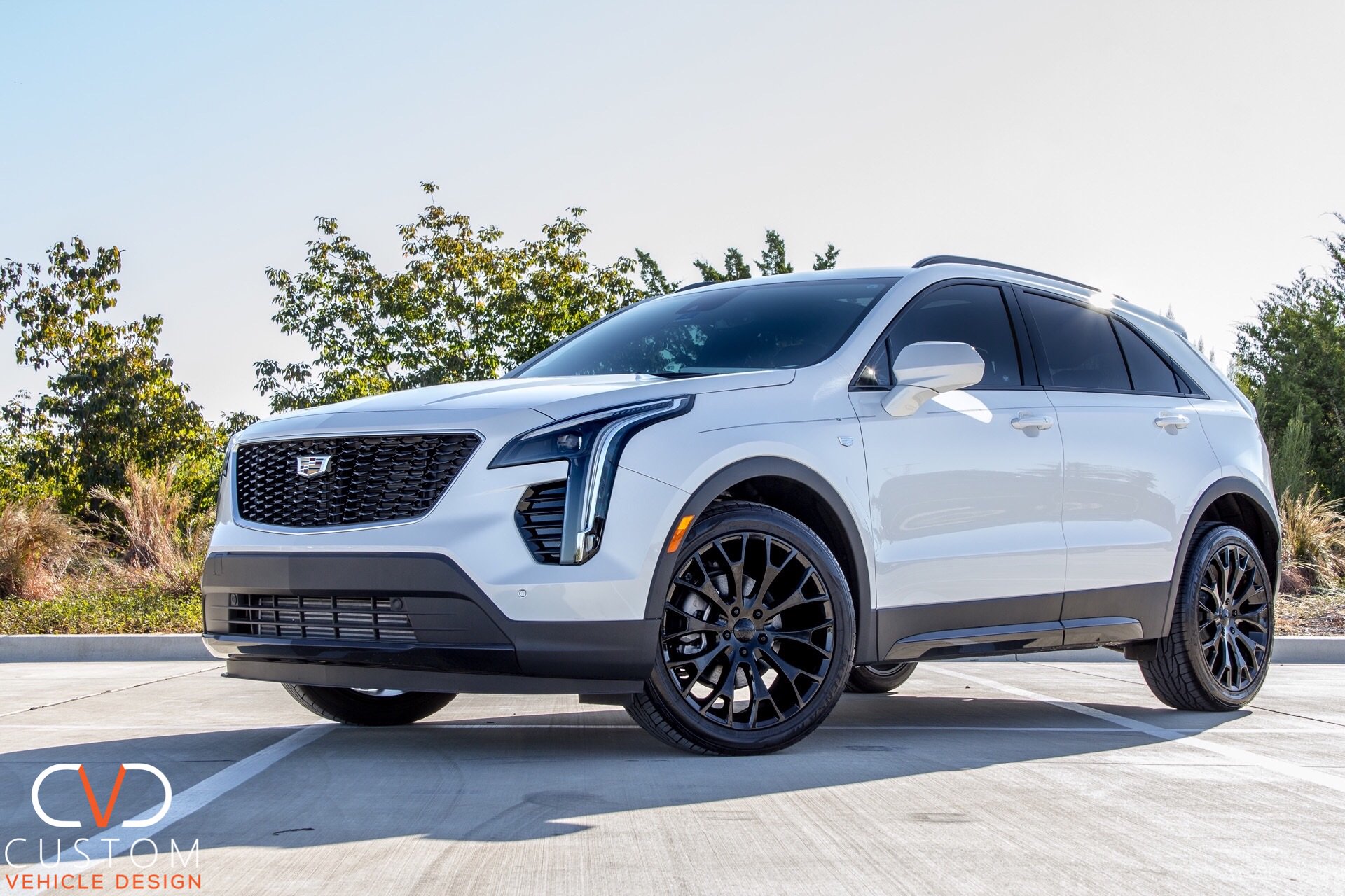 Custom Vehicle Designs on X Cadillac XT4 with Gloss Black Vogue VT383 wheels done by Custom Vehicle Design. What are you waiting for Customize your vehicle with CVD today