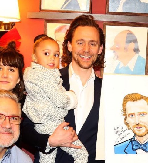 Tom Hiddleston Holding A Baby