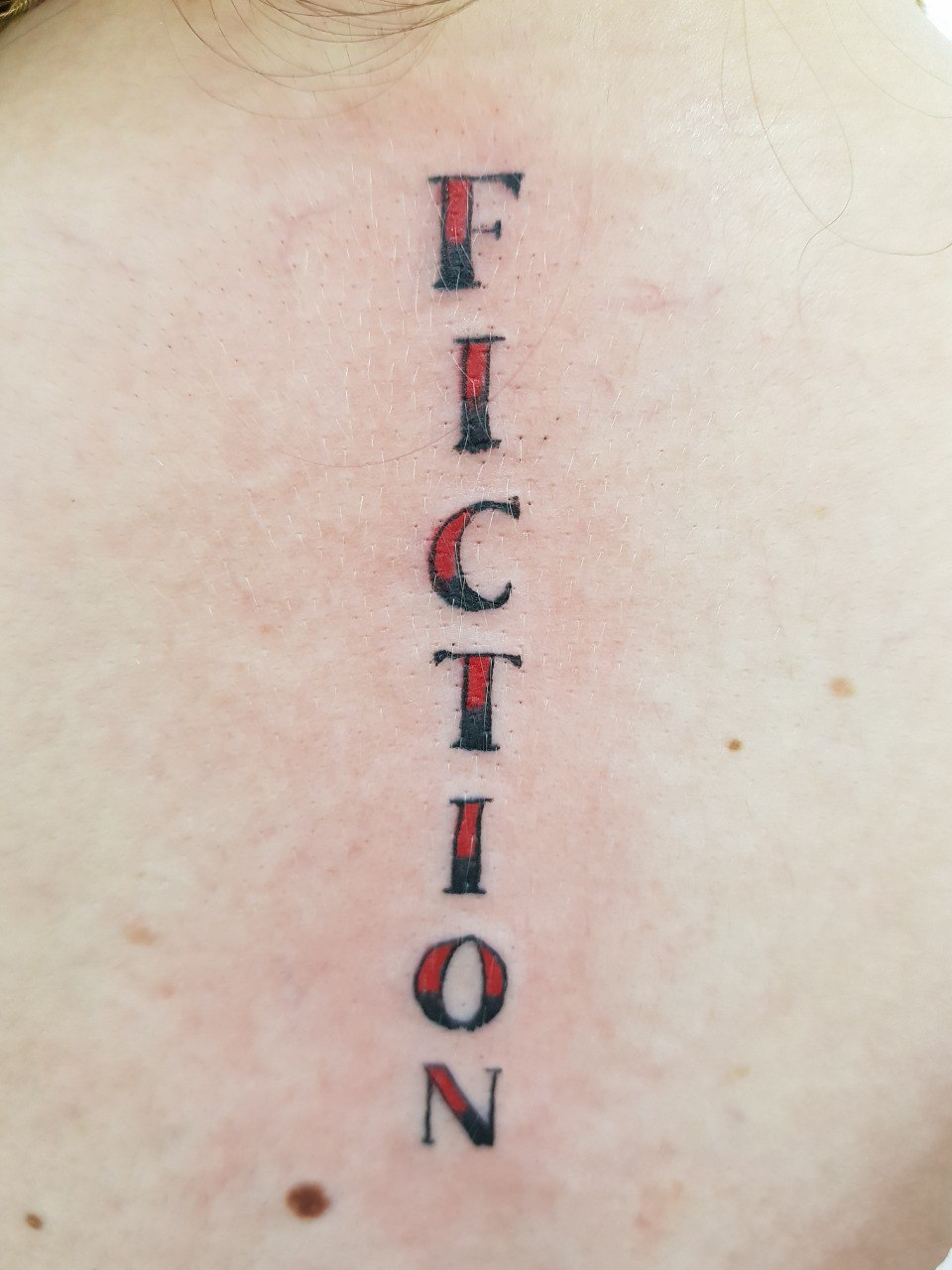 The Rev Fiction Tattoo