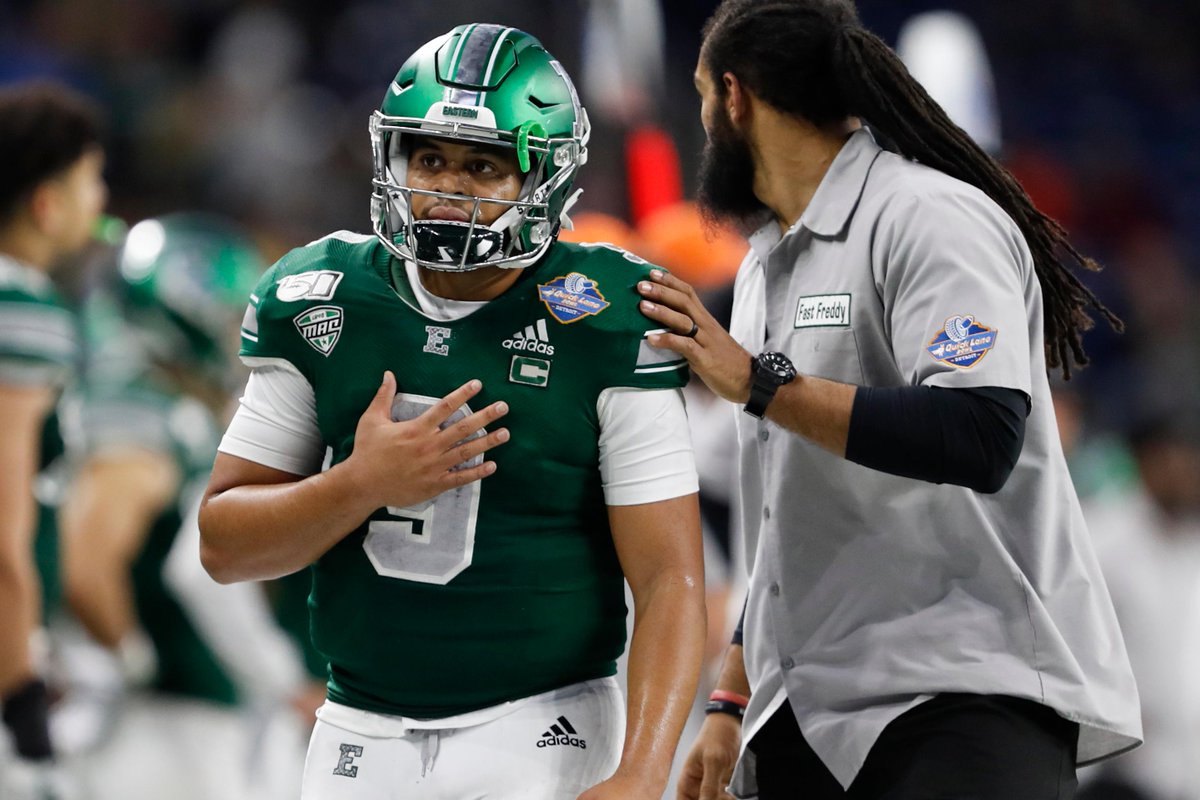 Eastern Michigan QB Mike Glass accidentally hit a referee, knocking him ...