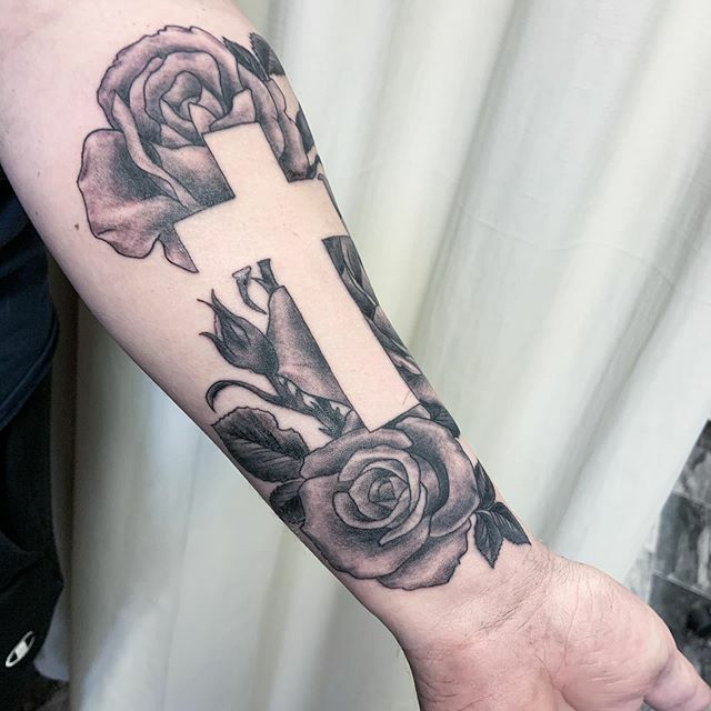 Negative Space Rose Tattoo