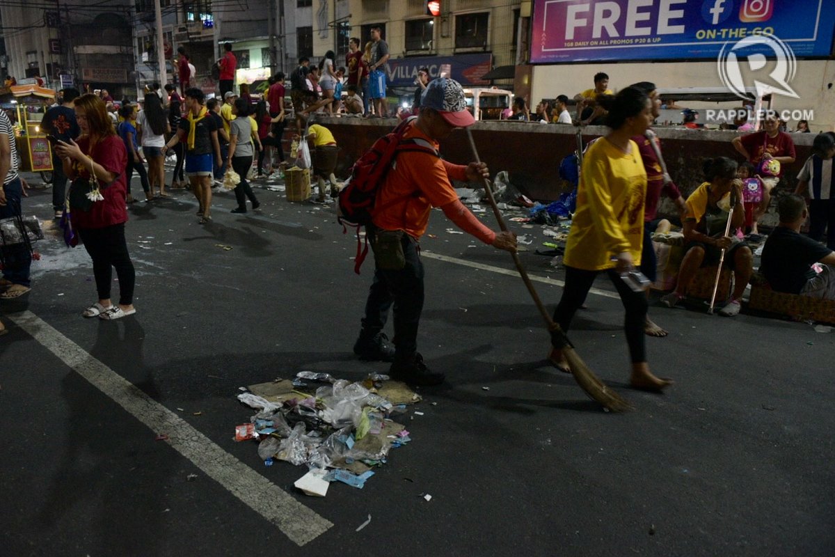 LOOK: MMDA workers clear the road along Quiapo Church in Manila of ...