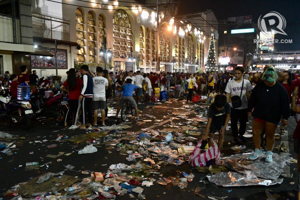 LOOK: MMDA workers clear the road along Quiapo Church in Manila of ...