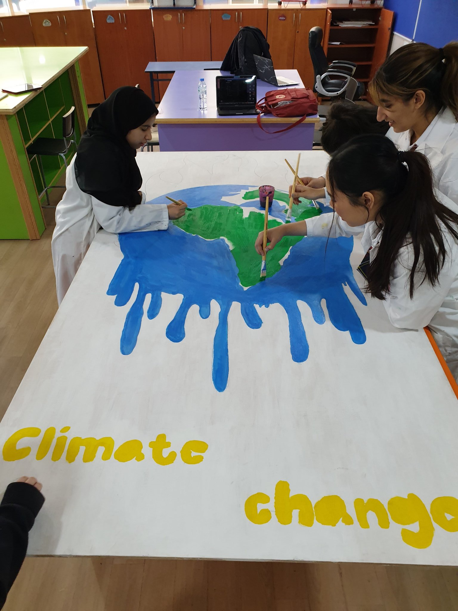 AIS Visual Arts on Twitter: "Blocking in on our climate change mural # ...