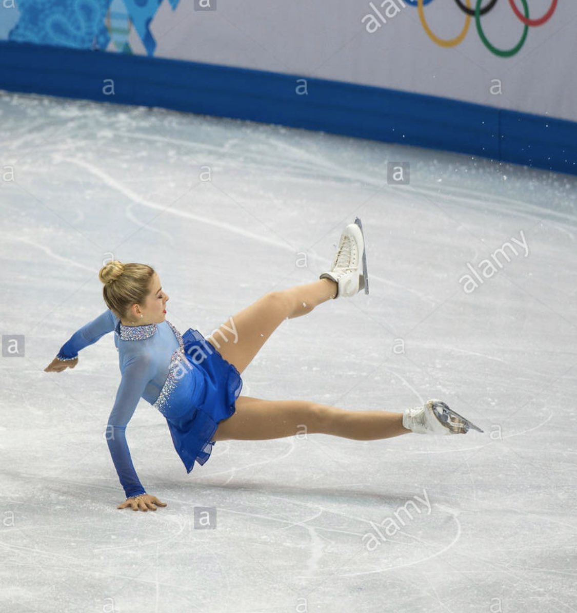 Couple Ice Skating Falling