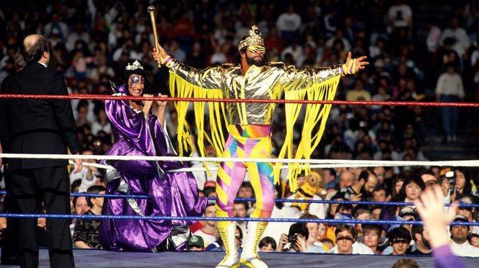 “Macho King” Randy Savage and “Queen” Sherri enter the ring for their ...