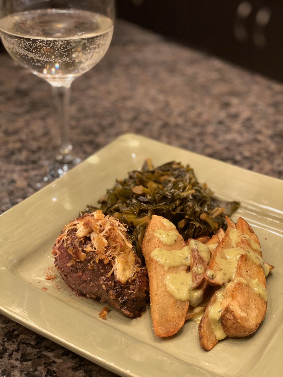 Cooked tonight ?? Filet Mignon topped with Crab meat Collard Greens ...