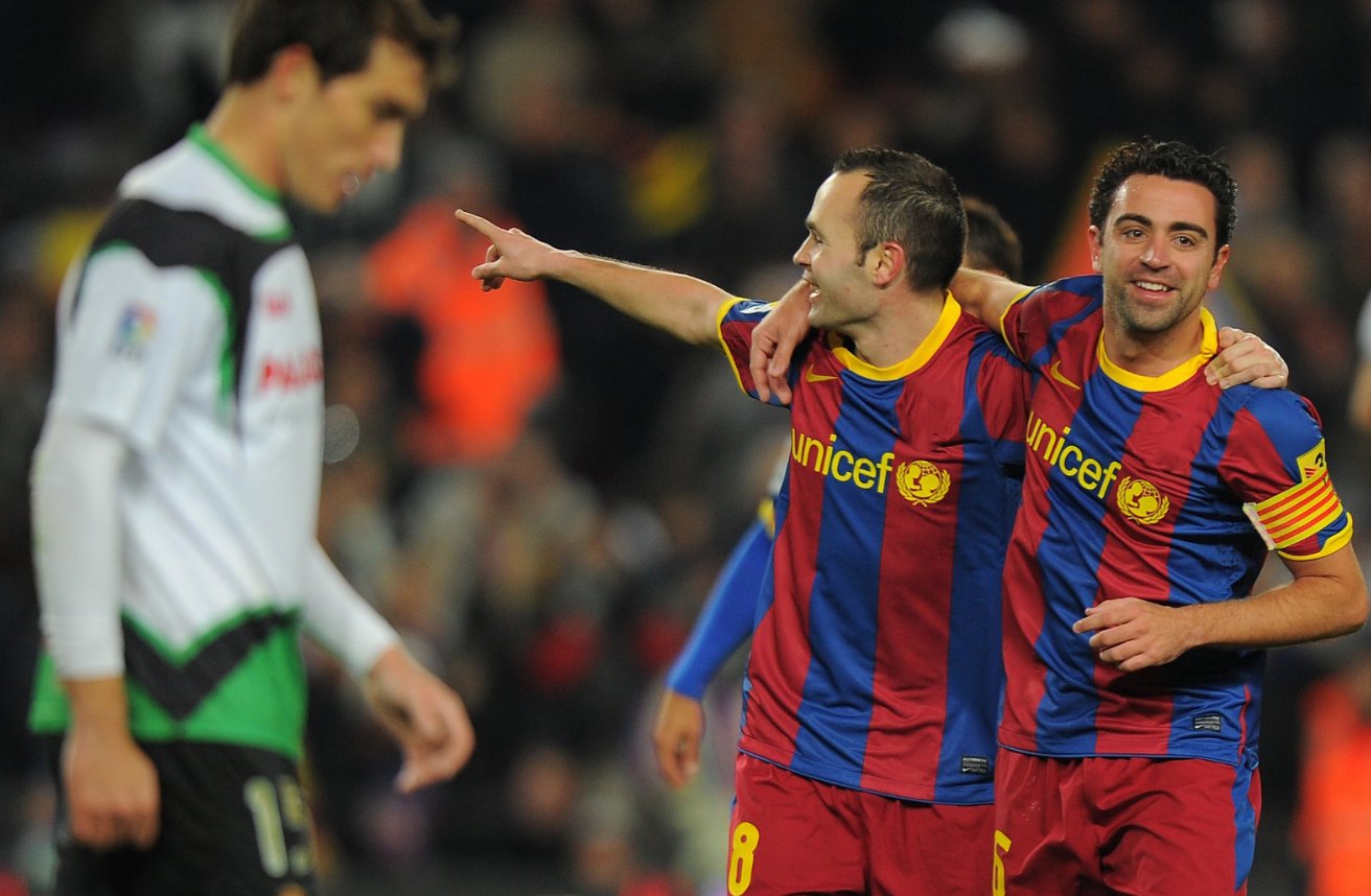 Xavi And Iniesta
