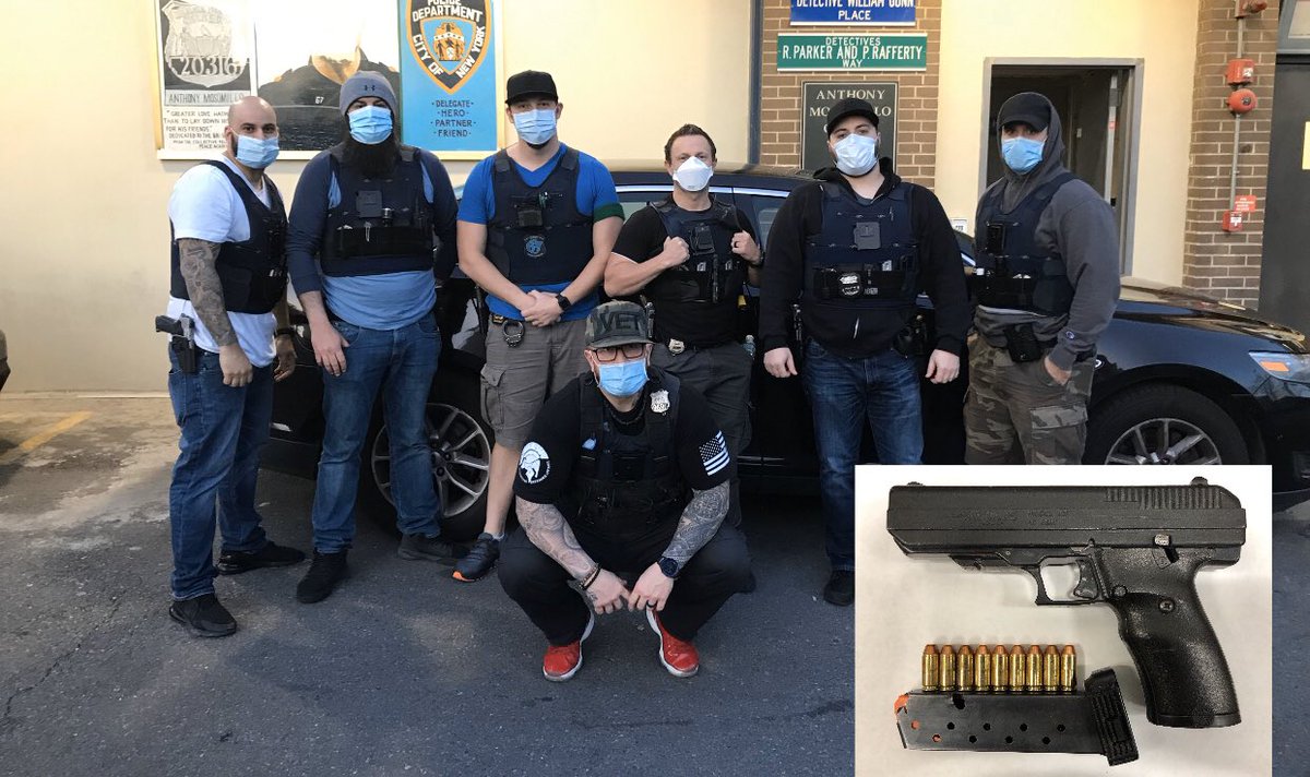 Gang Members Holding Guns