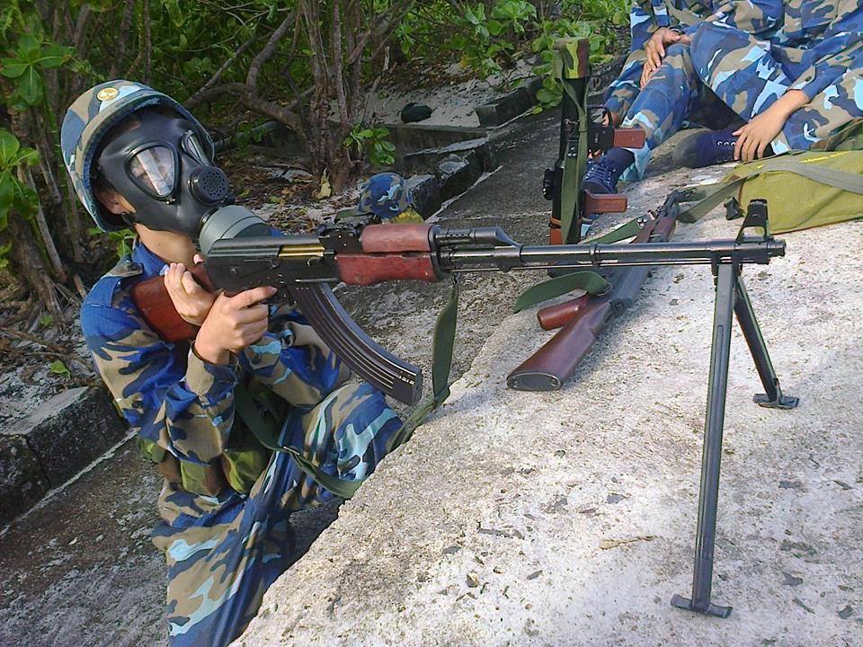 Lee Ann Quann on Twitter: ""Lovely day for exercising in gasmask" A conscript from Vietnam Naval ...