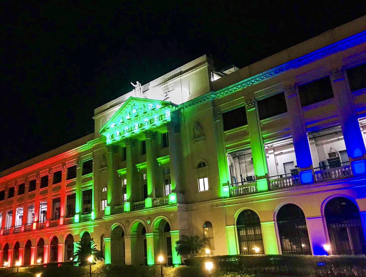 LOOK: DLSU- Manila lights up St. La Salle Hall with the colors of ABS ...