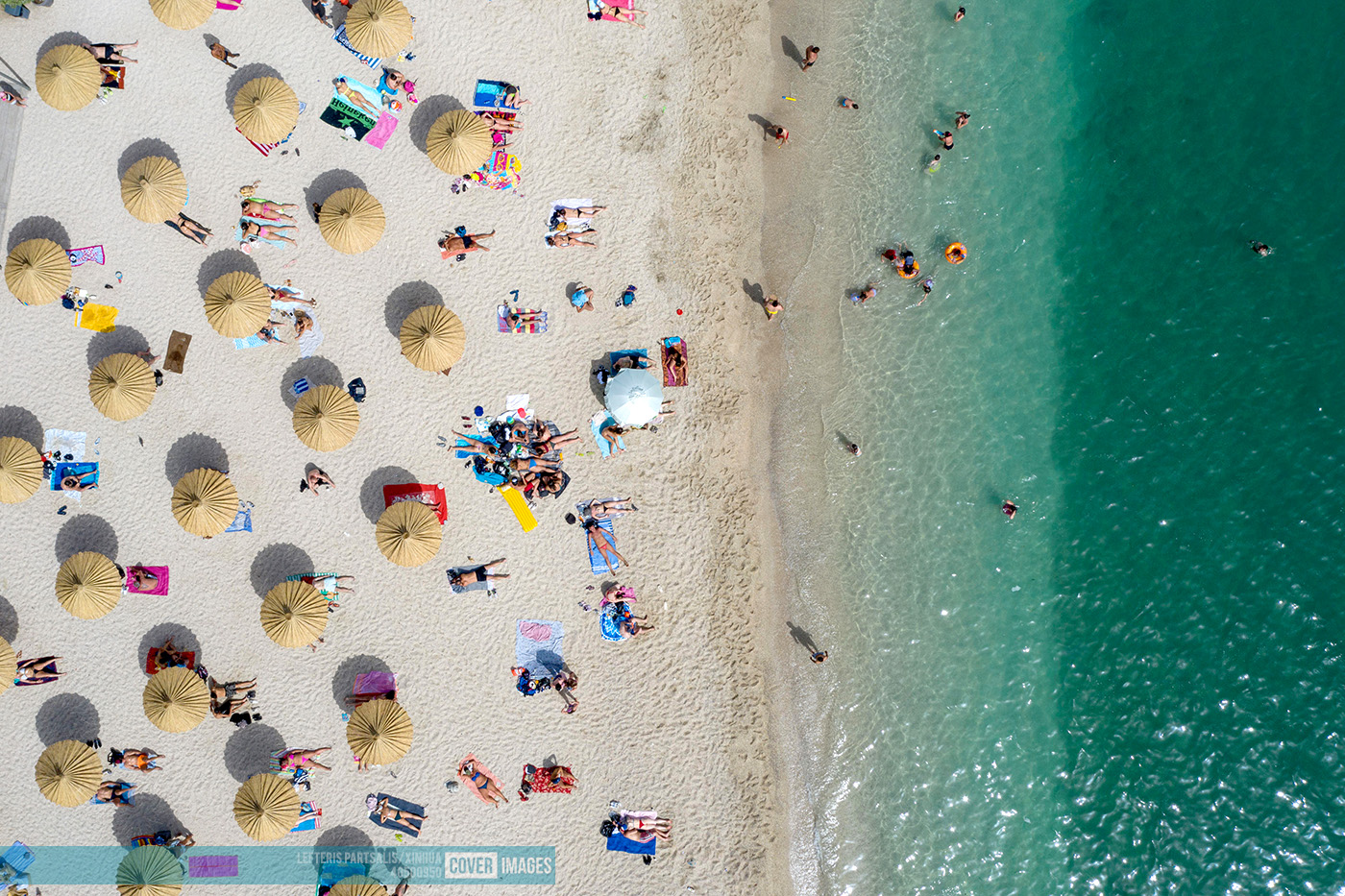 Cover Images on Twitter: "People flock to Alimos beach in Athens as Greece reopens its beaches 📷 ...