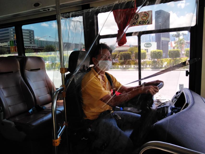 Filipino Bus Conductor