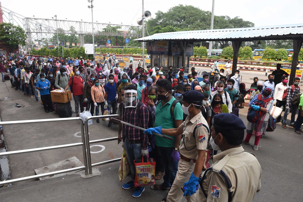 Overcrowded buses, long queues of office goers at bus stands and ...