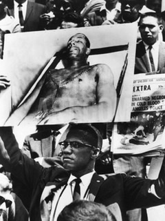 Malcolm X In His Casket