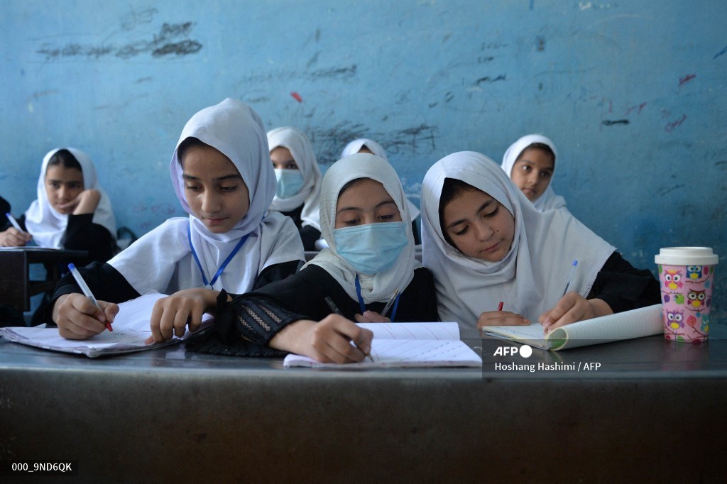 Young female students attending a class at Gawhar Shad Begum school in ...