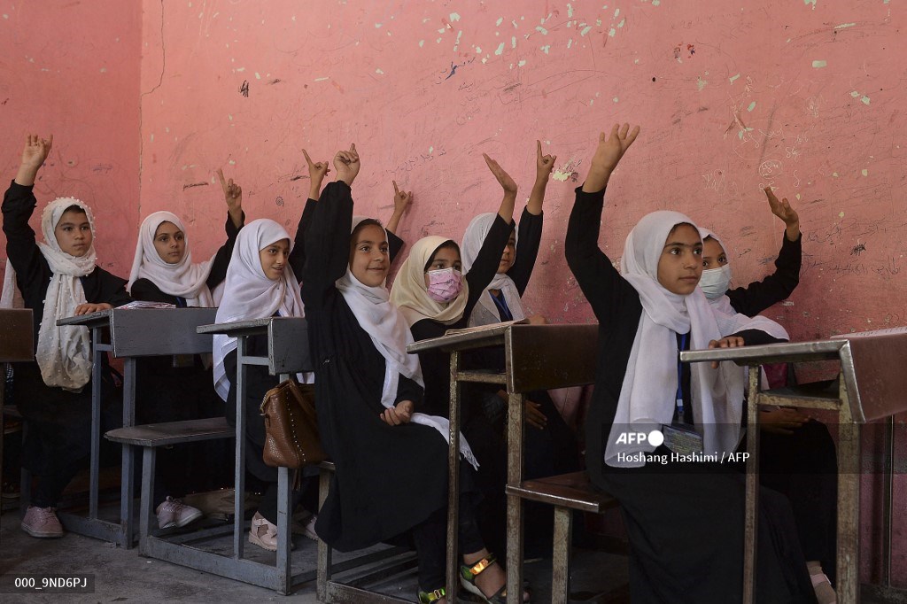 Young female students attending a class at Gawhar Shad Begum school in ...