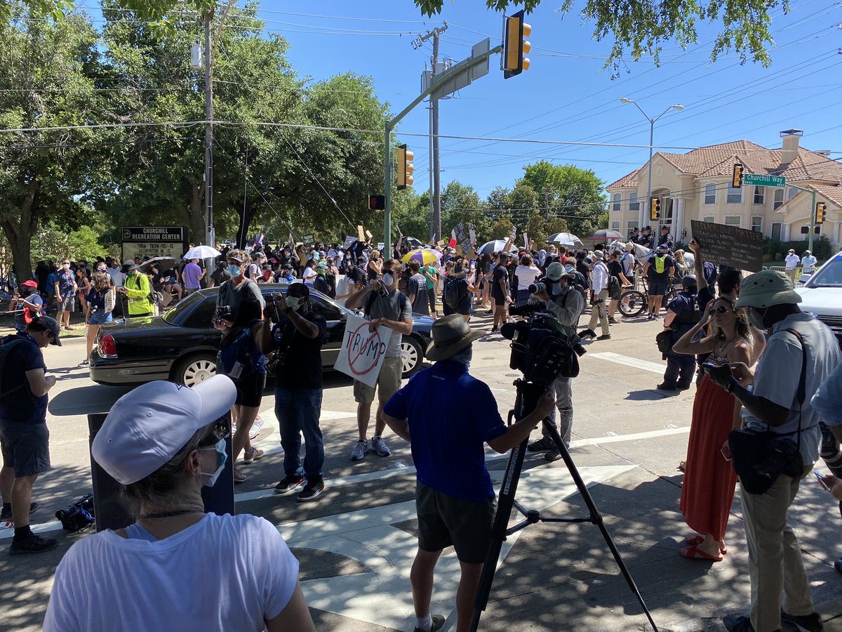 Large group of protesters, across from the Dallas church where ...