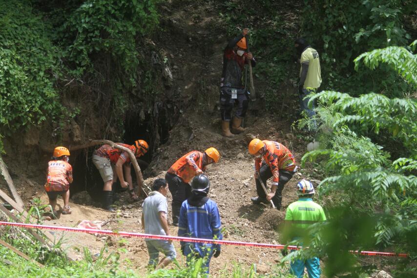 Ongoing search and rescue operations for two persons trapped inside a ...